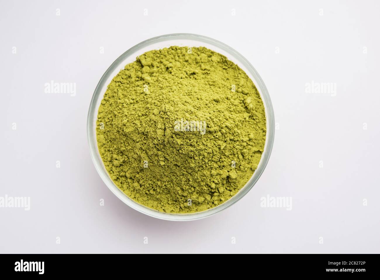 Herbal henna or Mehandi powder in a bowl forming heap, Used for Tattoo ...