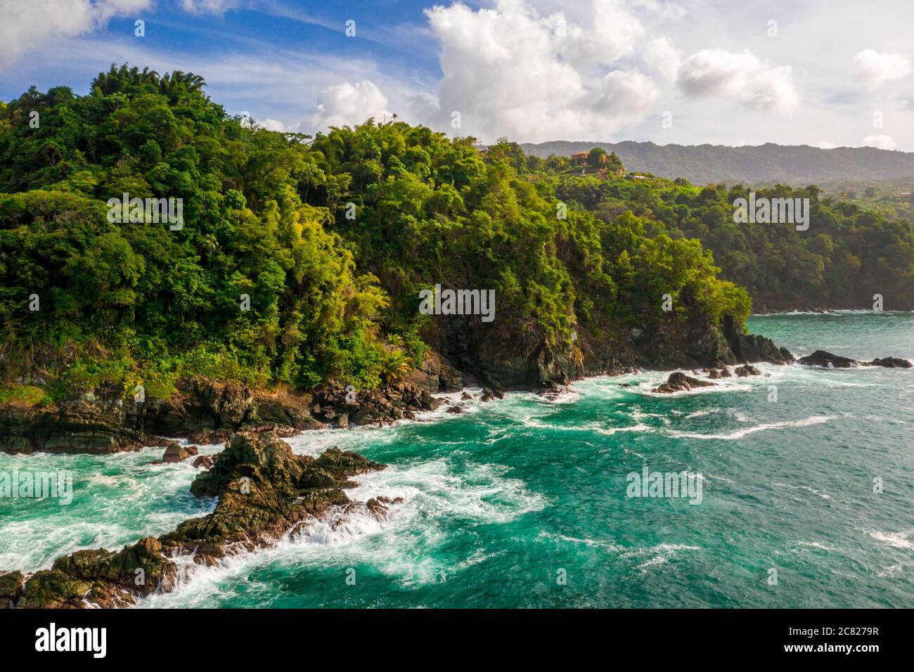Aerial beautiful shot of an island seashore with a sea on the side ...