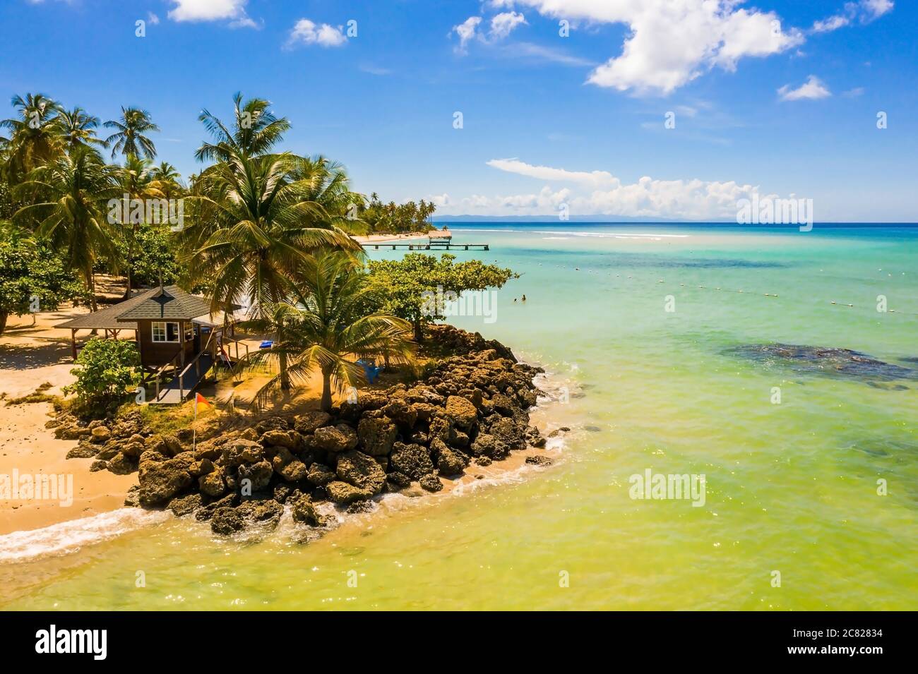 Aerial beautiful shot of an island seashore with a sea on the side ...