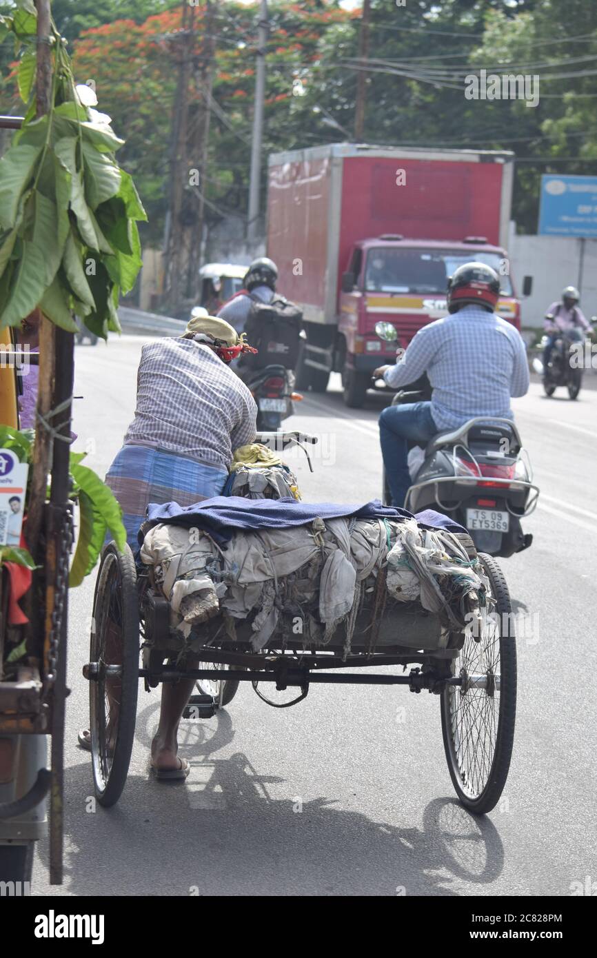 Man pulling cart hi-res stock photography and images - Alamy