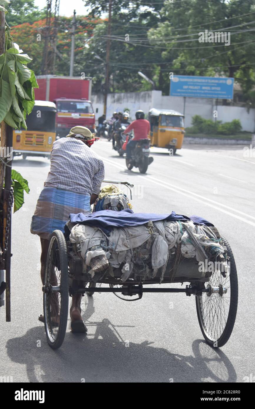 Hyderabad, Telangana, India. july-20-2020: old man pulling his cart at ...
