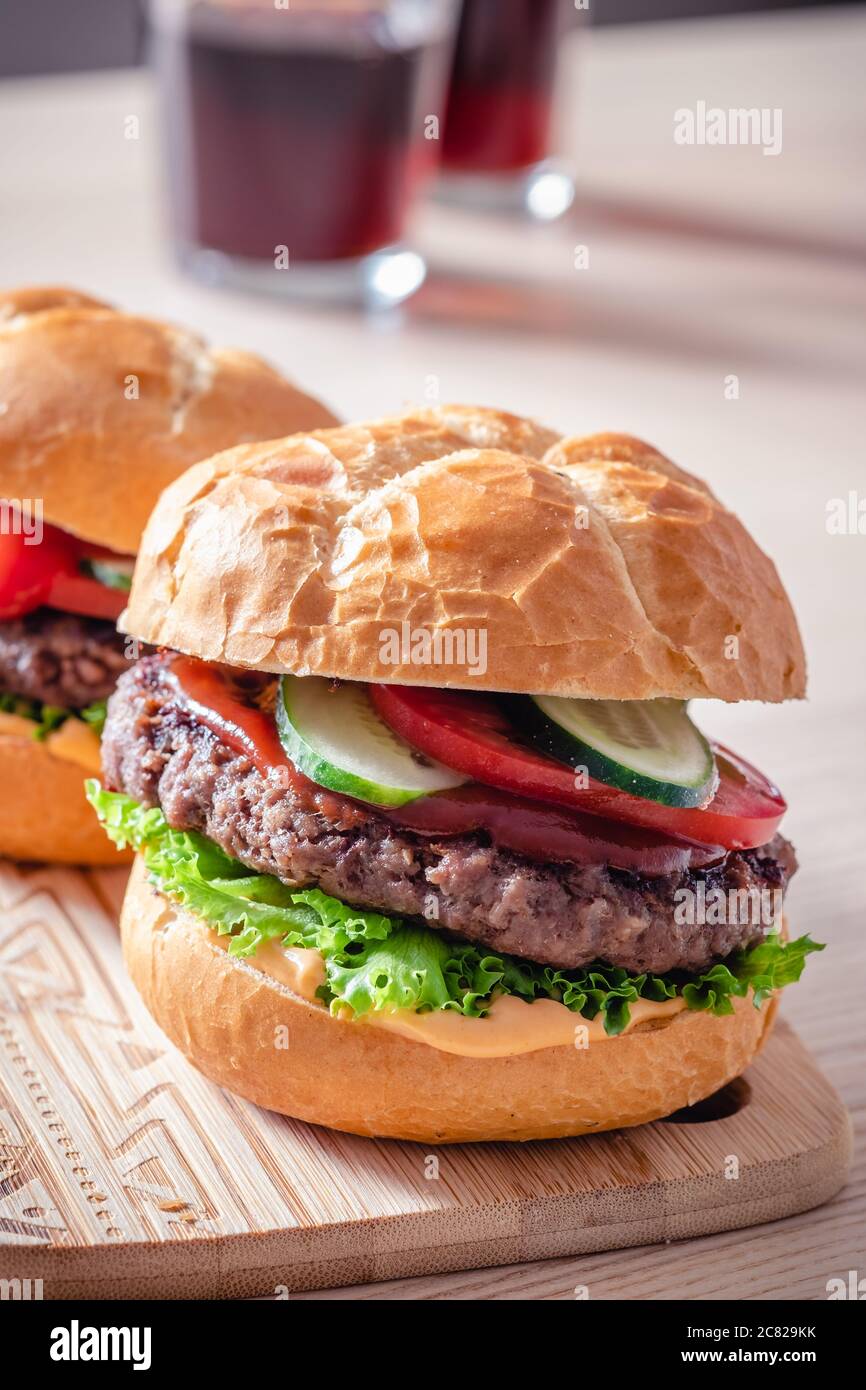 Hamburger with fresh vegetables Stock Photo - Alamy