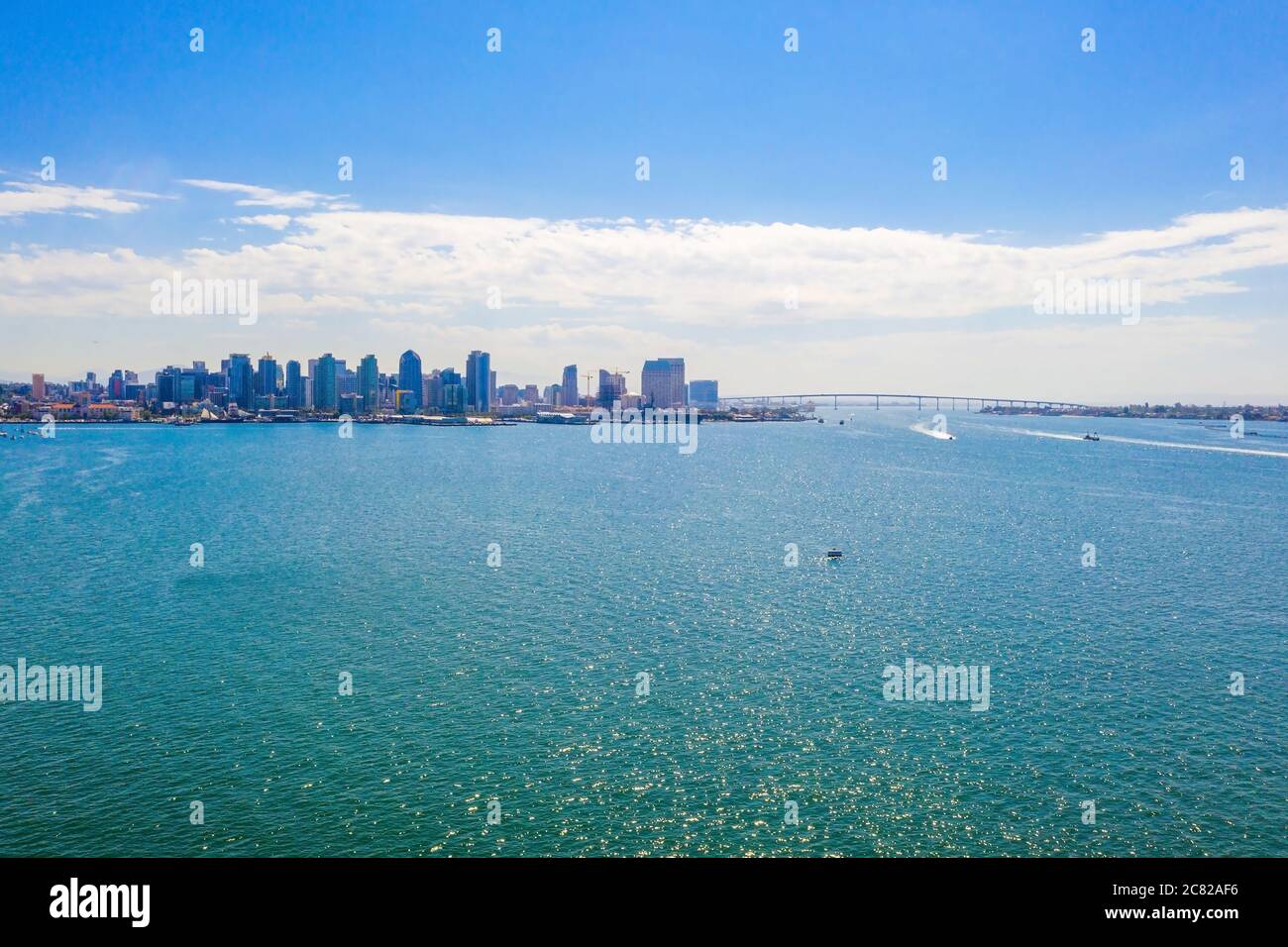 Aerial shot of the sea with buildings on the background Stock Photo - Alamy