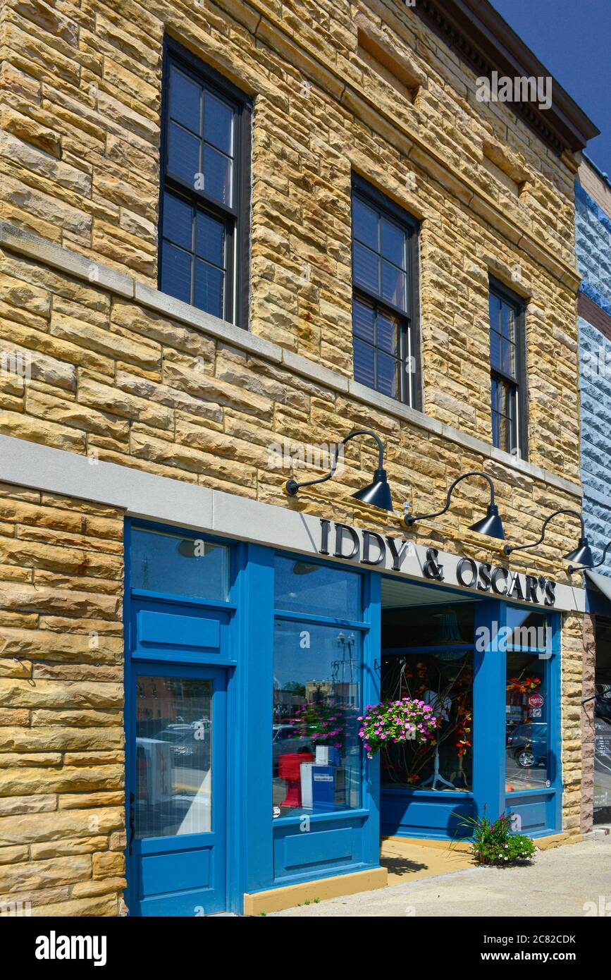 Dramatically textured rough stone building with updated elements ...