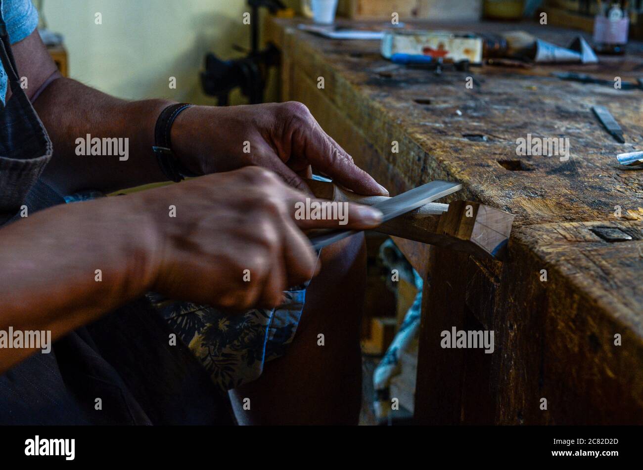Violin maker luthier Carlos Roberts in his Cremona Italy workshop ...