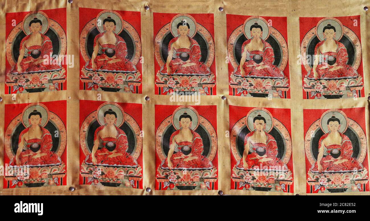 Tibetan thangka-Buddha Sakyamuni pinned to the wall. Thirty-three ...