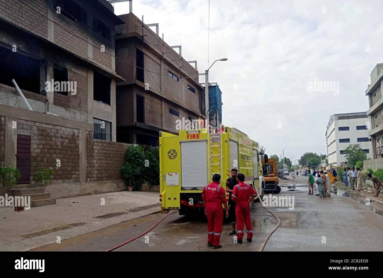 View of venue after fire broken out incident as the fire brigade staffs are busy in ...
