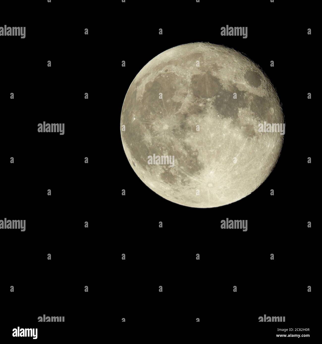 Beautiful full moon gleaming in the dark Stock Photo - Alamy