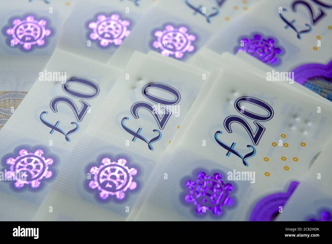 British pound sterling banknotes. Corners of 20 pound notes. Close up ...