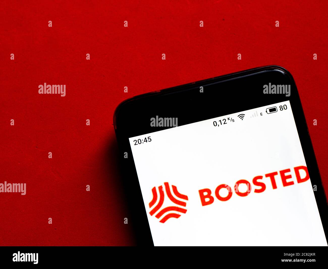 In this photo illustration a Boosted logo is seen displayed on a ...