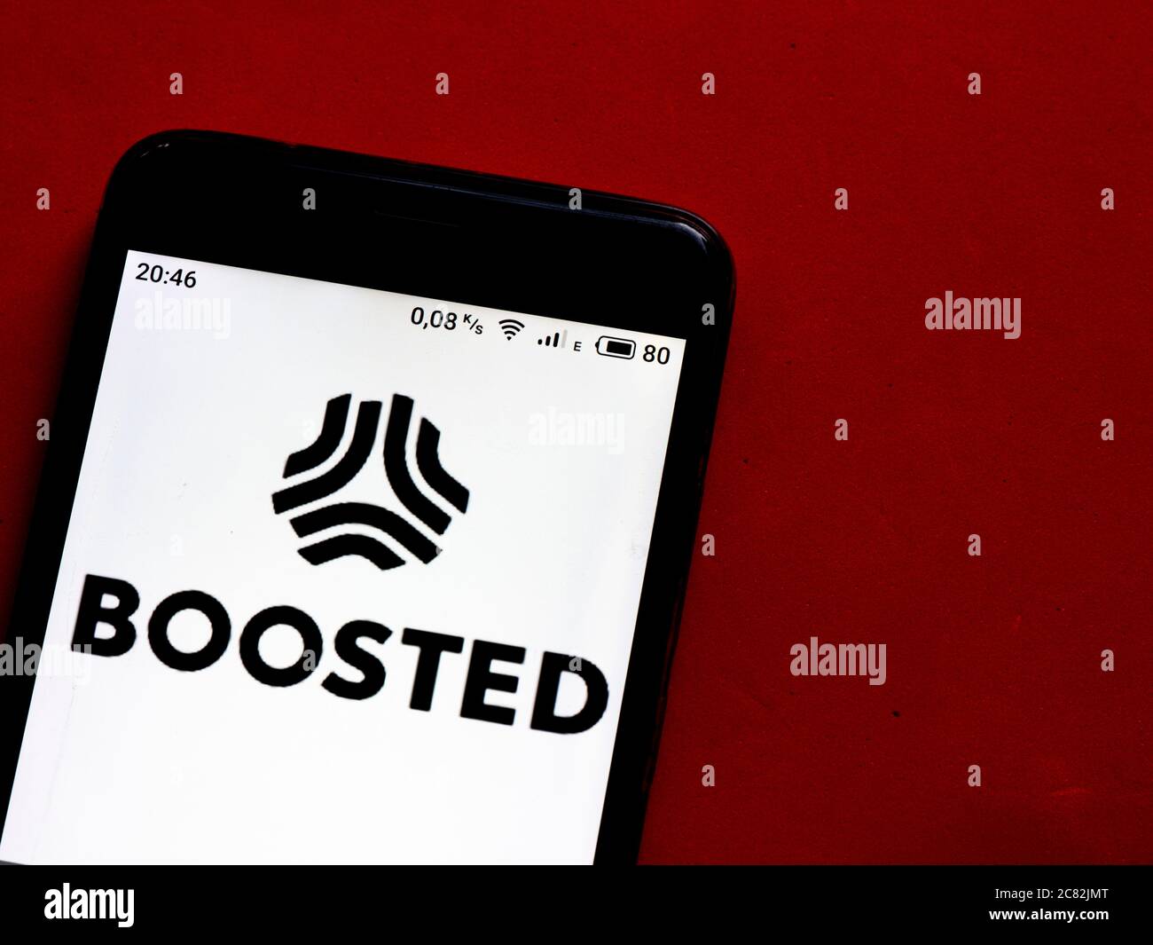 In this photo illustration a Boosted logo is seen displayed on a ...