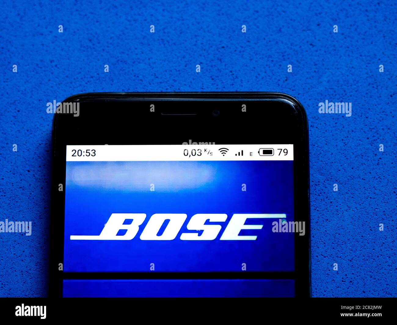 In this photo illustration a Bose logo is seen displayed on a ...
