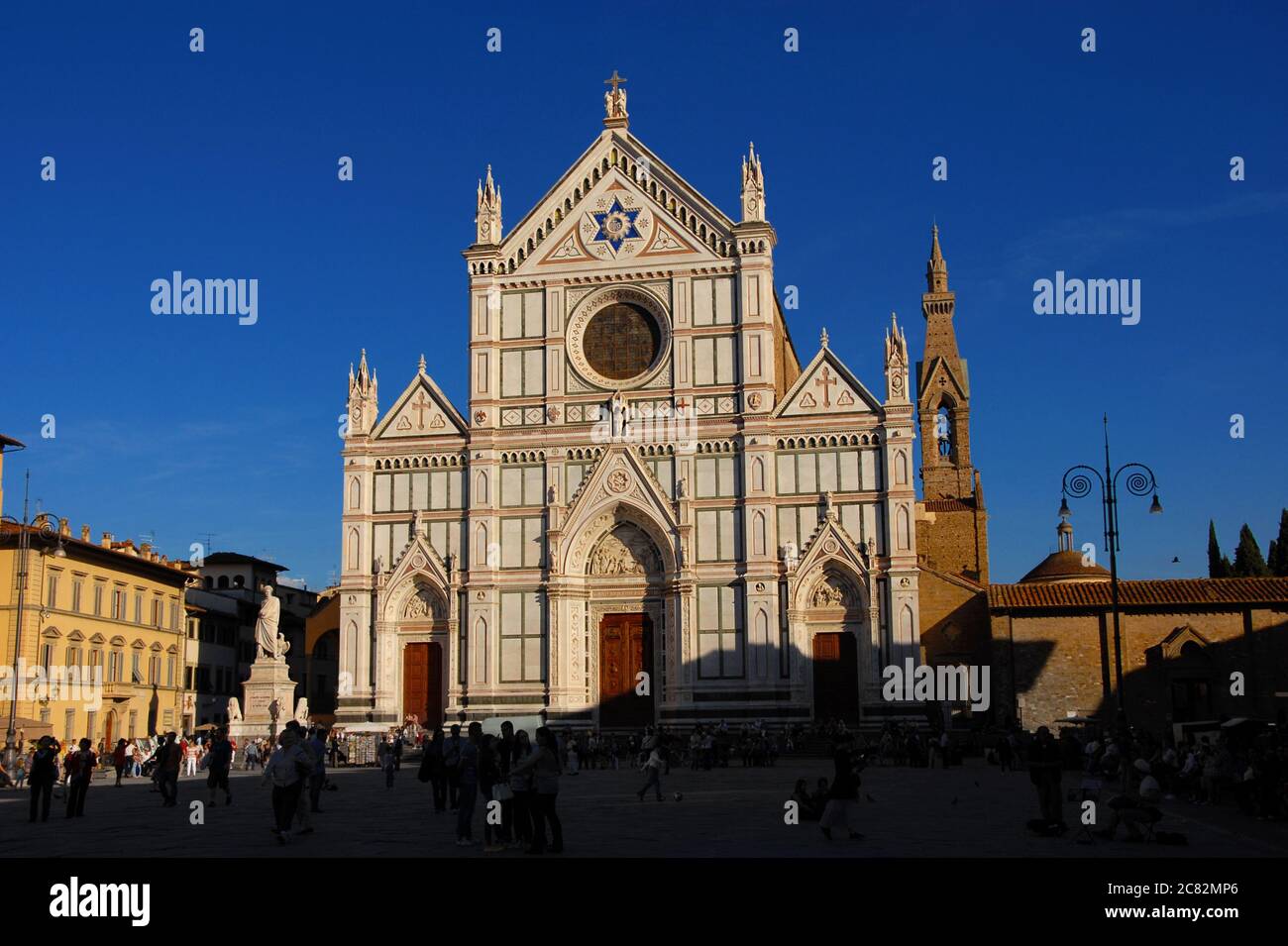 Tourism in Florence. A crowd of people in Santa Croce Square outside ...