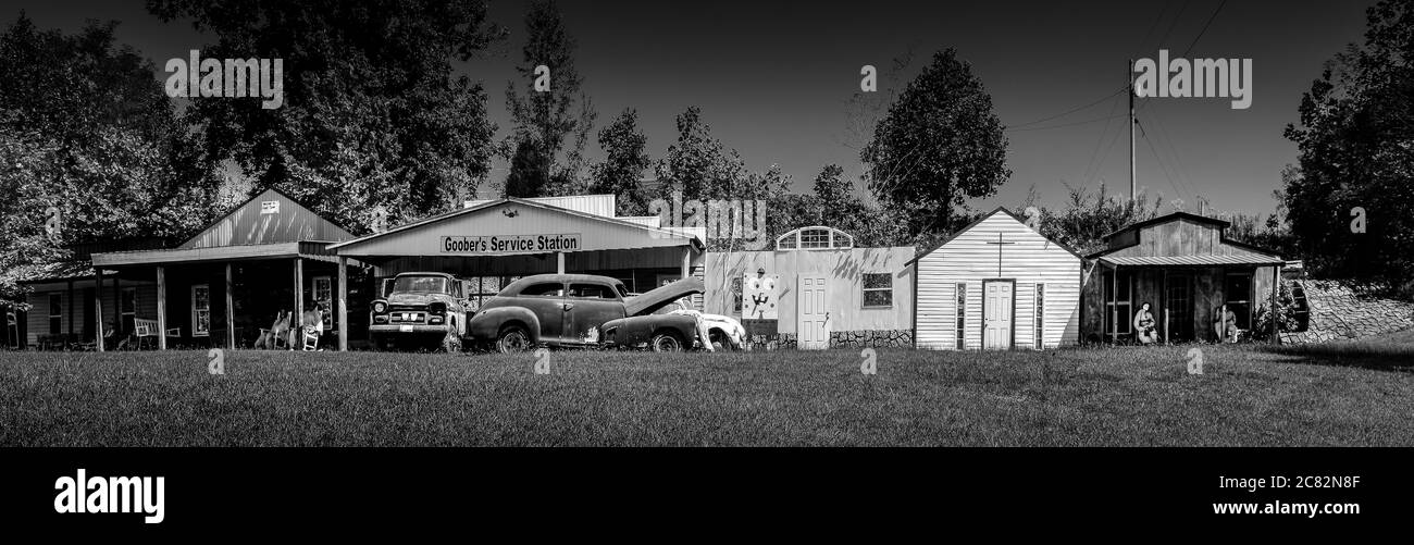 A panoramic format of a Fake Town, with a fake Goober's Service Station ...