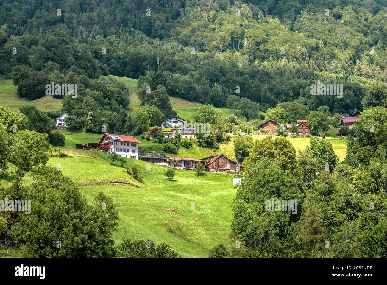 Landscape of Alpine mountains, small village in Switzerland. Scenery of ...