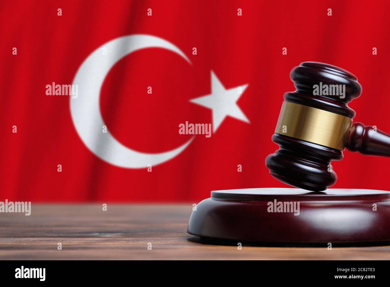 Justice and court concept in Republic of Turkey. Judge hammer on a flag ...