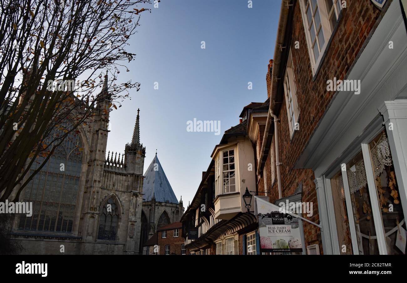 The eastern end of York Minster seen from College Street. Old fashioned ...