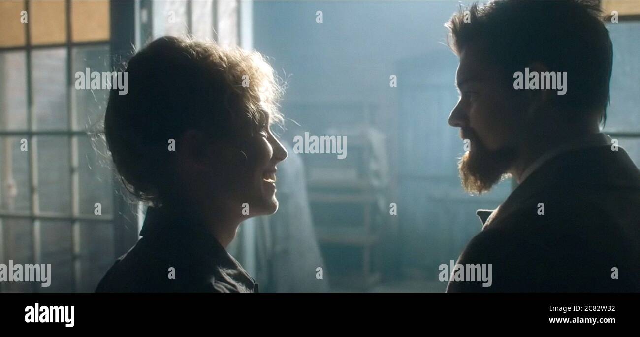 RADIOACTIVE, from left: Rosamund Pike as Marie Curie, Sam Riley as ...