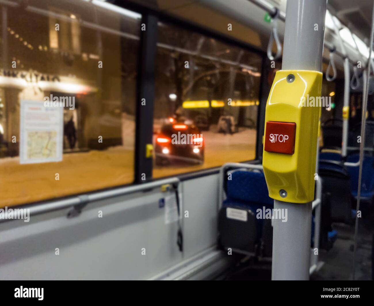 Closeup shot of a red stop button in a bus Stock Photo - Alamy