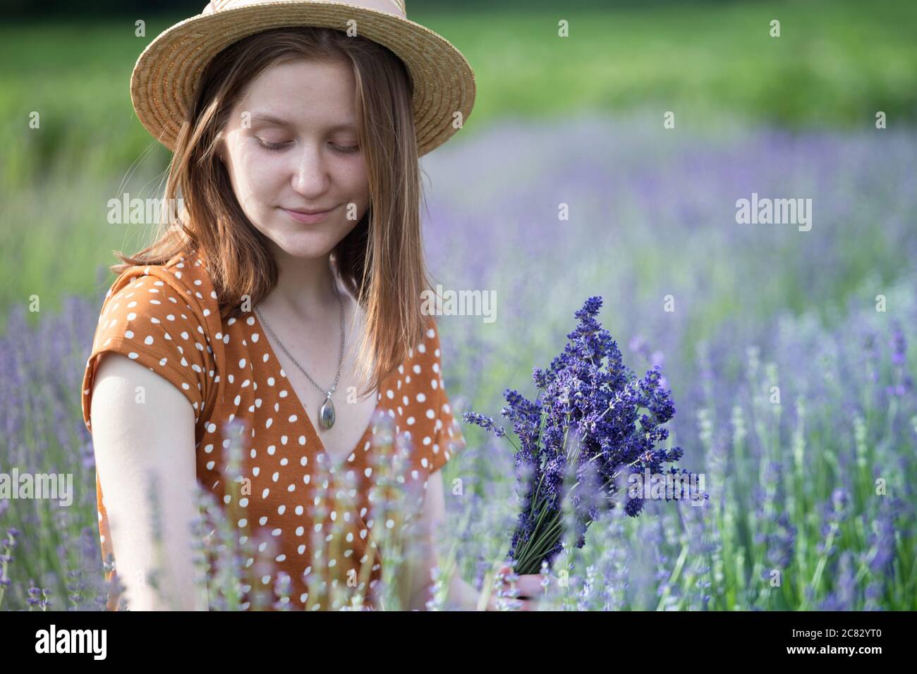 Beautiful girl collects bouquet hi-res stock photography and images - Alamy