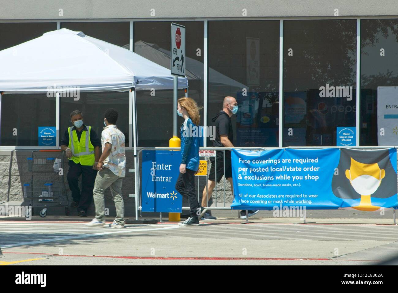 Plano, USA. 20th July, 2020. Customers wearing face masks enter a ...