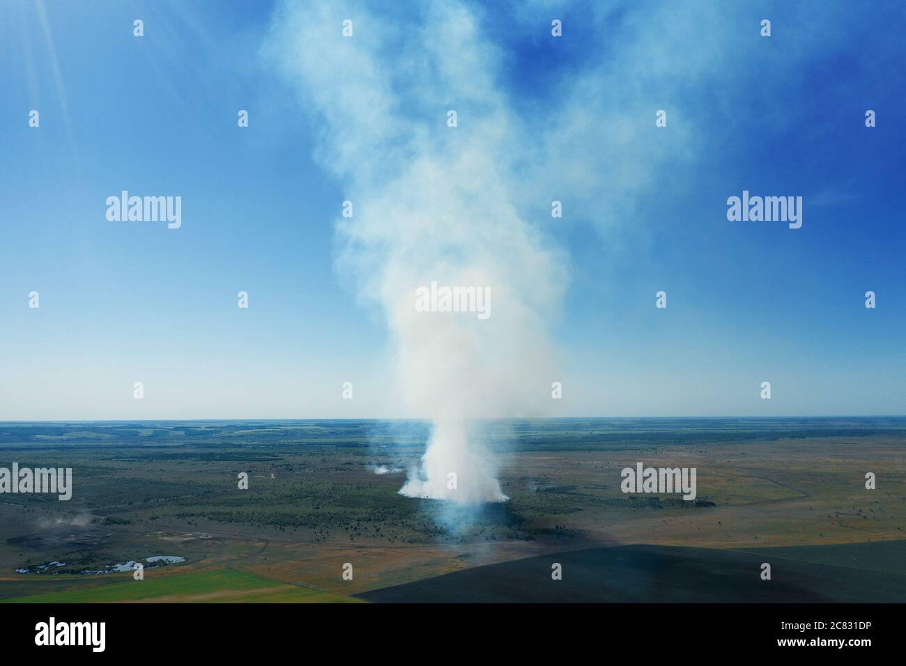 Wildfire, dry grass burns aerial view, natural disaster. Fire from heat ...