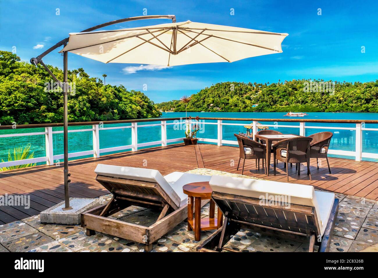 A beautiful resort sun deck on a tropical island in the Philippines ...