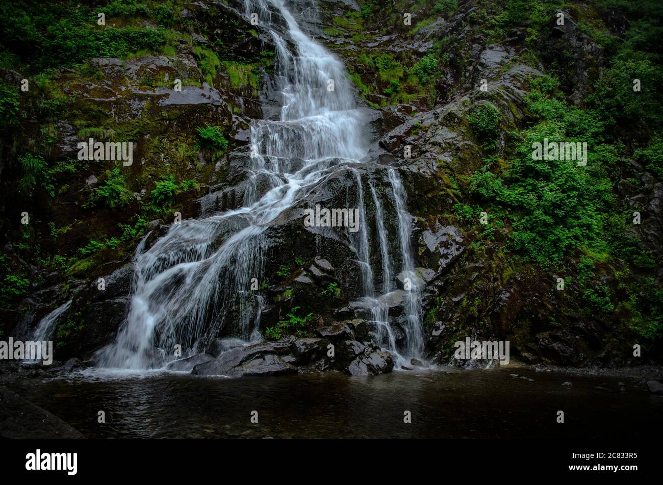 Beautiful scene of the waterfall between rocks of Flood Falls Hope in ...