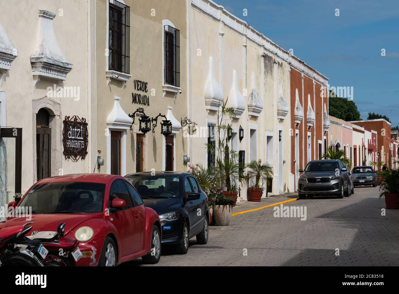 Painted Spanish colonial buildings on the Calzada de los Frailes in ...