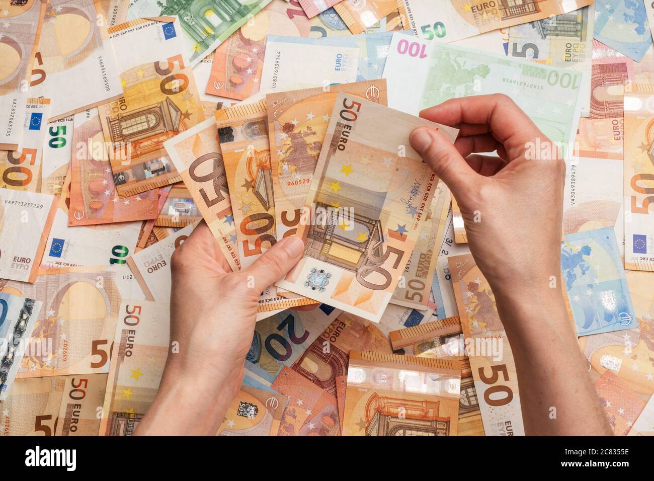 Pair hands counting hi-res stock photography and images - Alamy