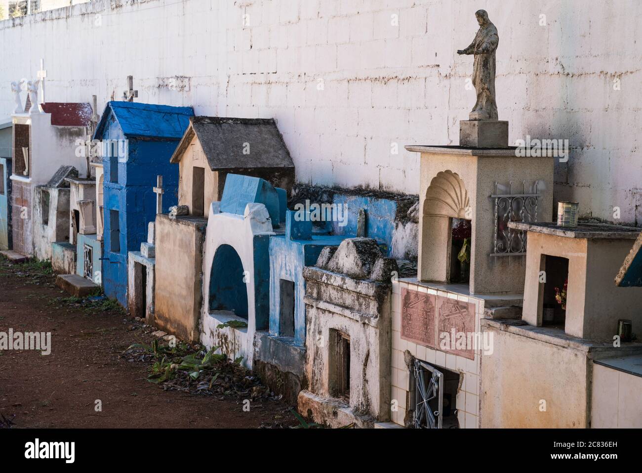 Colorful gravestones in a traditional cemetery in Holca, Yucatan ...