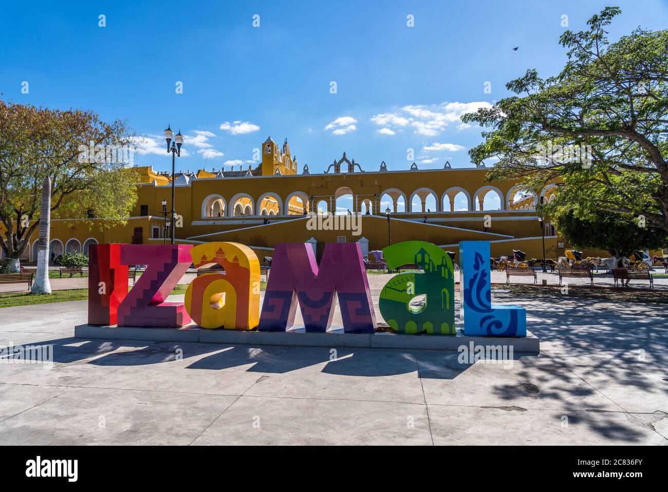 The colorful town sign of Izamal, Yucatan, Mexico, known as the Yellow ...