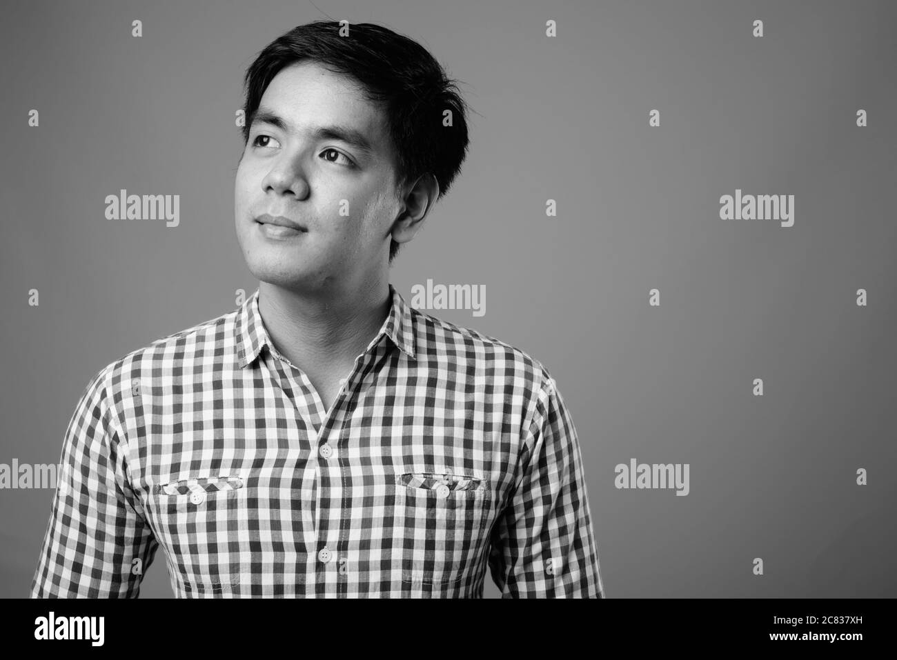 Portrait of young handsome Filipino hipster man Stock Photo - Alamy