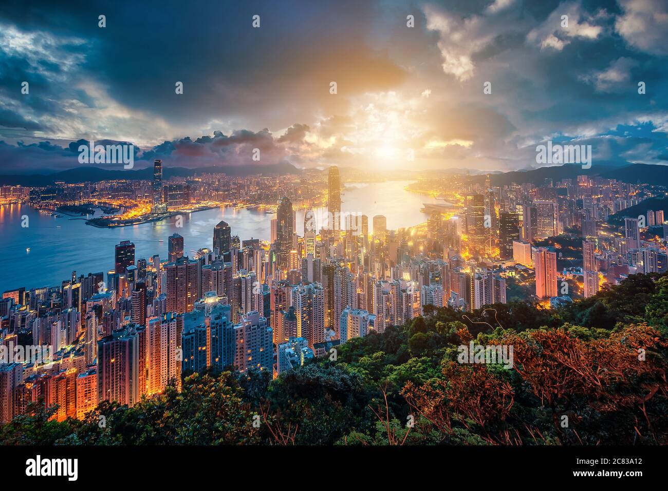 Hong Kong city skyline at sunrise view from Peak mountain Stock Photo - Alamy