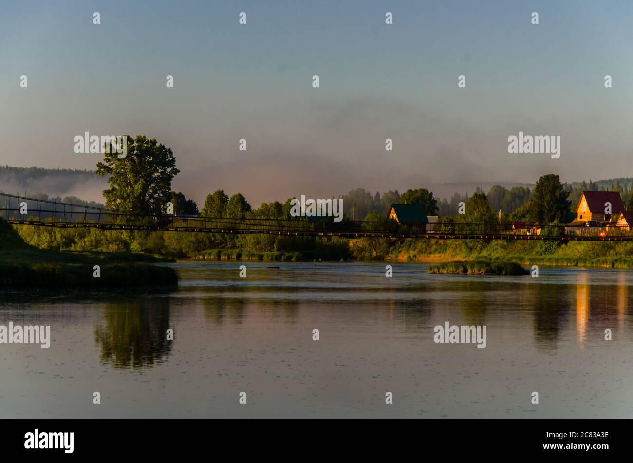 houses on the beach. Rural river in the early morning Stock Photo - Alamy