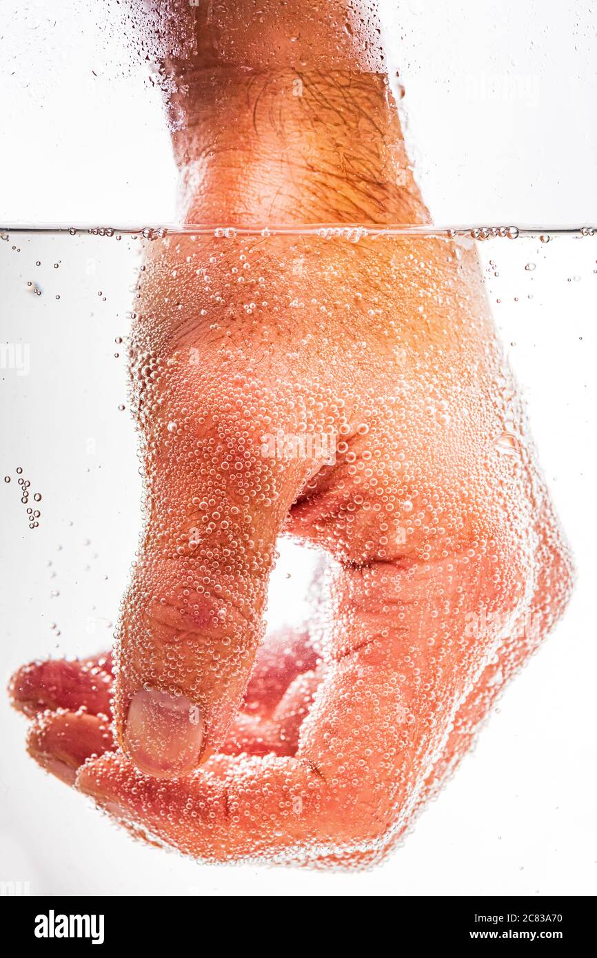 Cold water hand submerged hi-res stock photography and images - Alamy