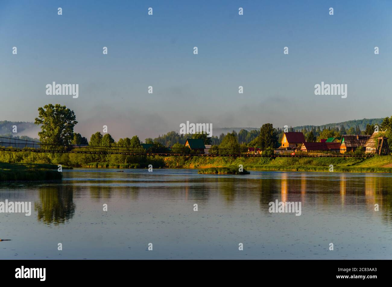 houses on the beach. Rural river in the early morning Stock Photo - Alamy