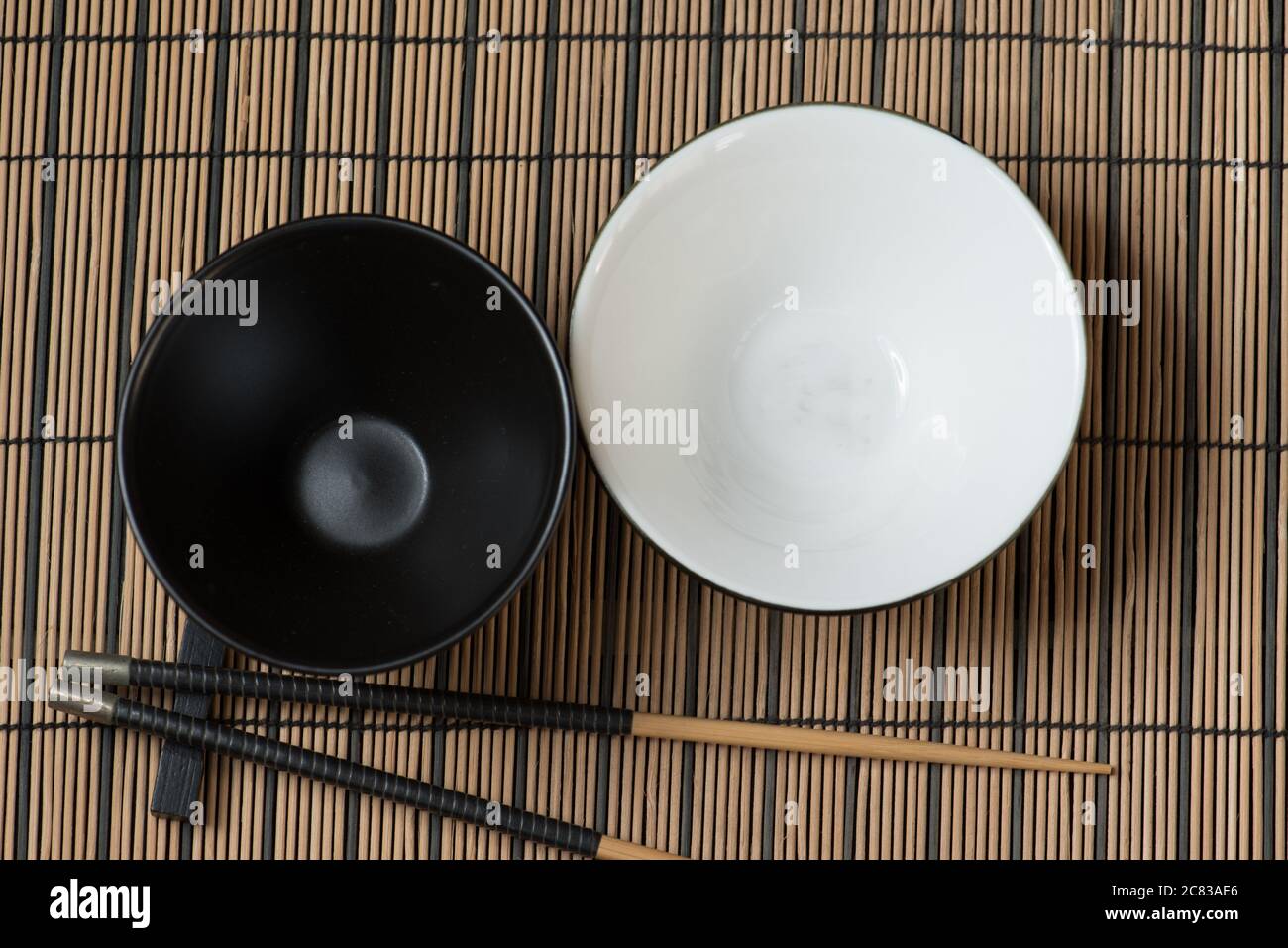 Top view of black and white bowls and a chopstick - Thai kitchenware ...