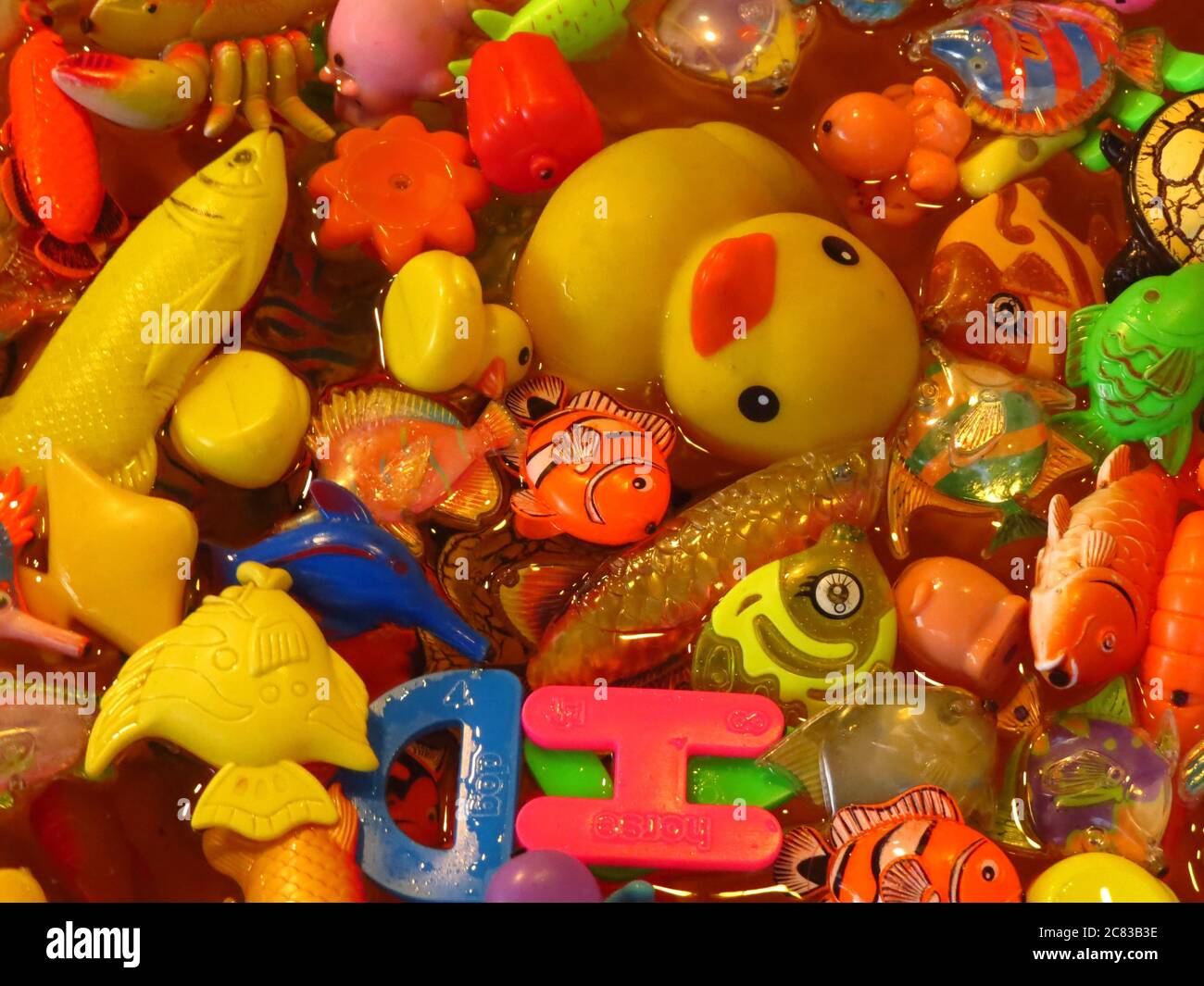High angle shot of different types of colorful toys in a bunch Stock ...