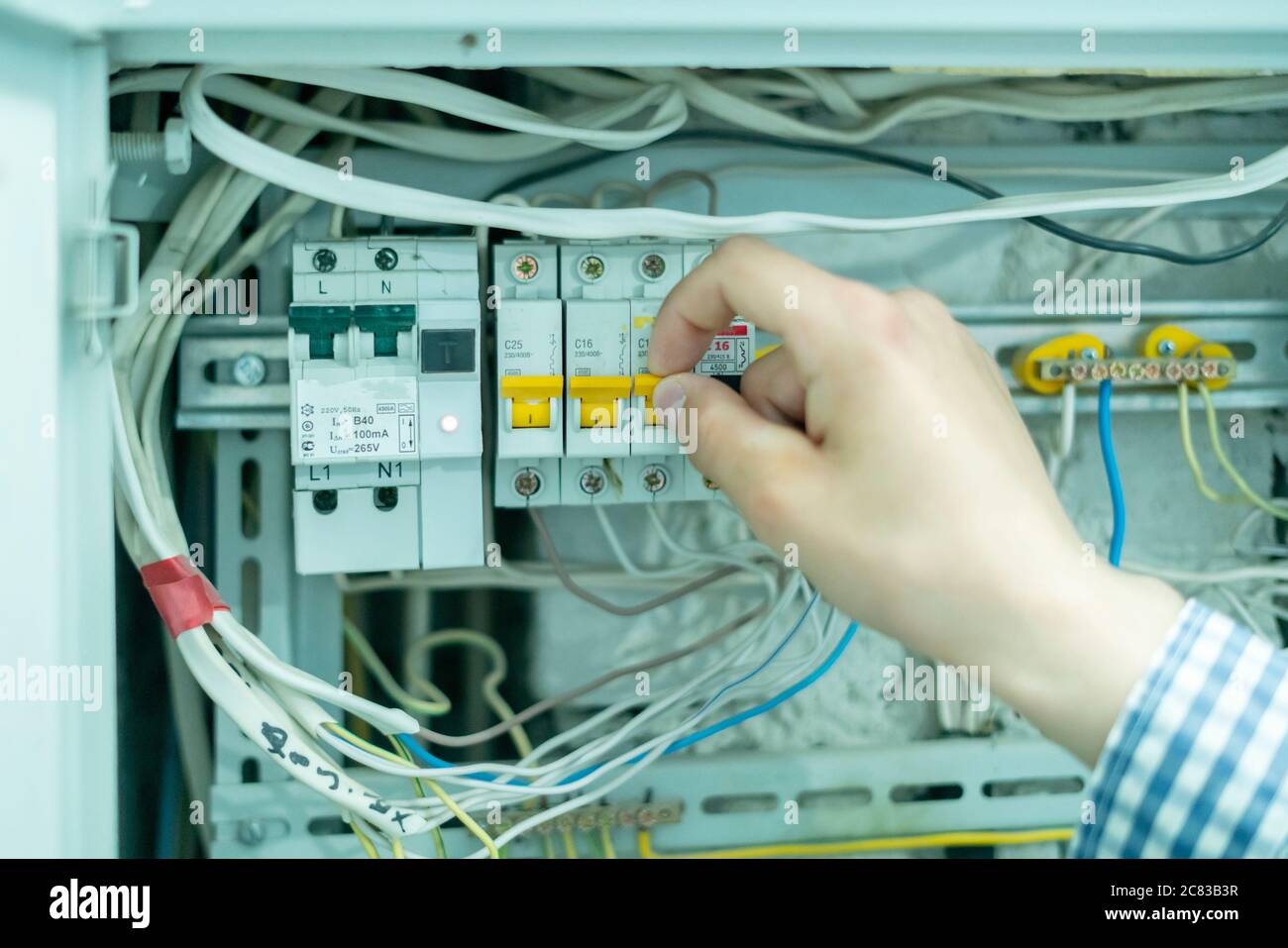 Electrician fixing electrical panel hi-res stock photography and images ...