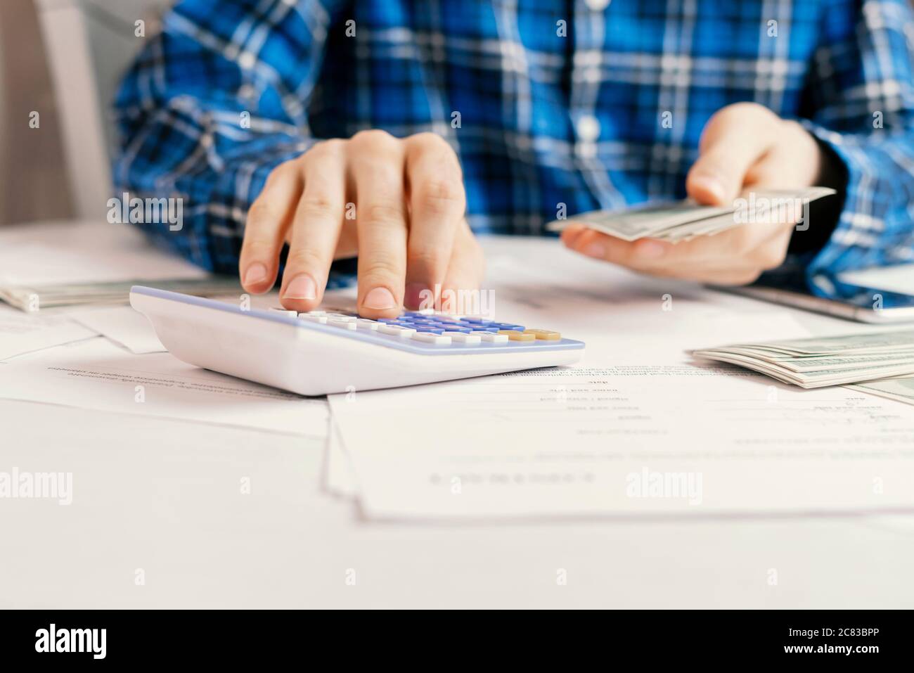 the counting cash money, person calculate personal earnings and savings ...