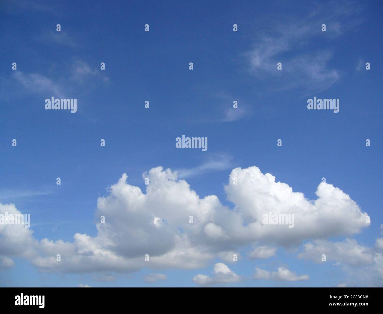 Beautiful scenery of water vapor condensing into clouds in a blue sky ...