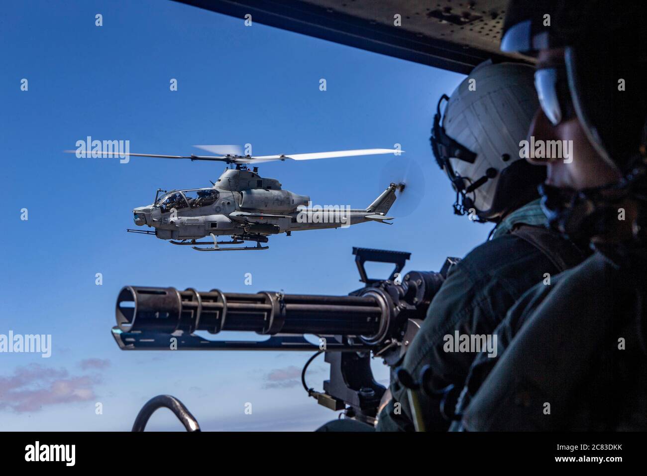 An AH-1Z Viper helicopter flies alongside a UH-1Y Venom helicopter ...