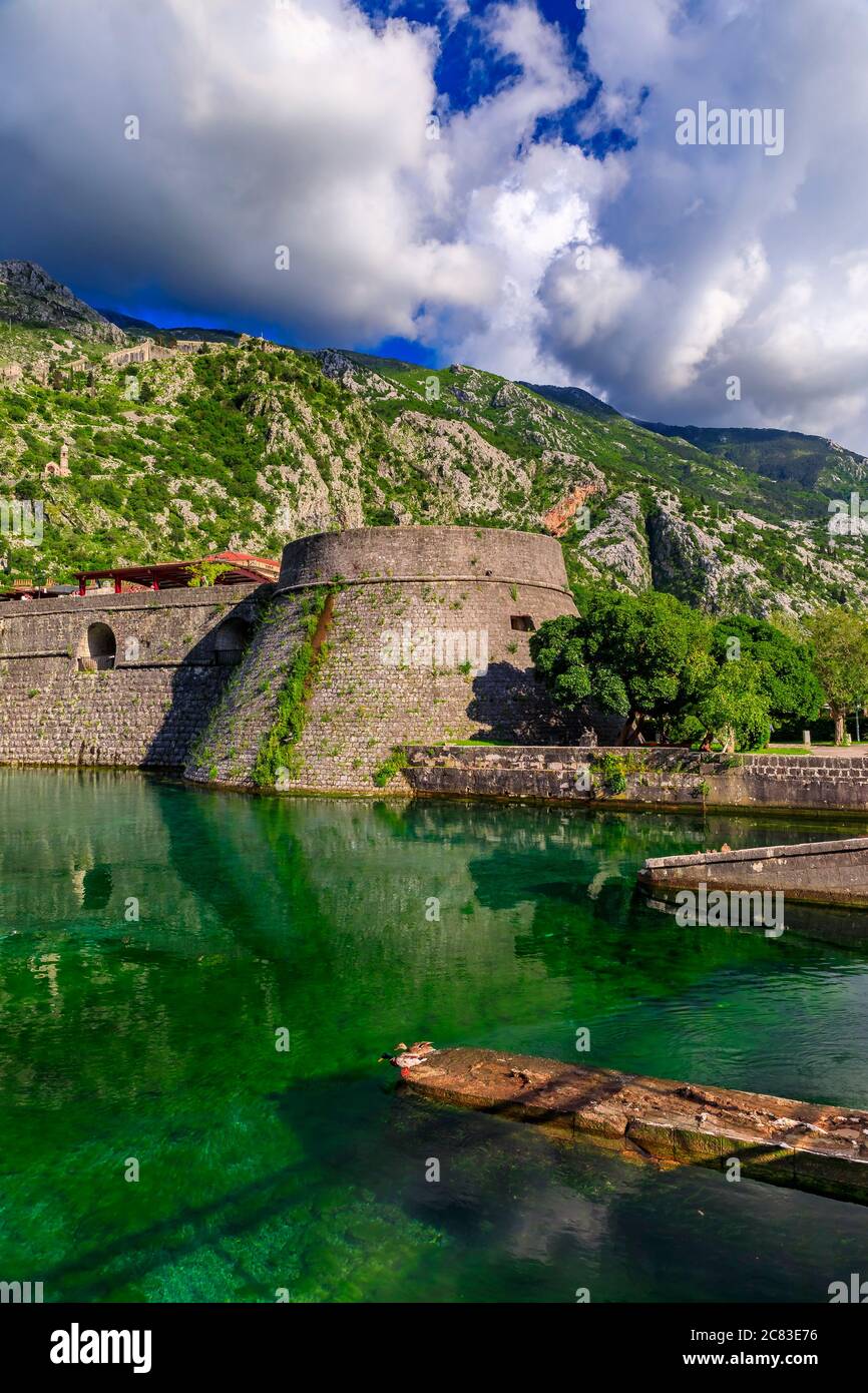 Emerald green waters of Kotor Bay or Boka Kotorska, mountains and the ...