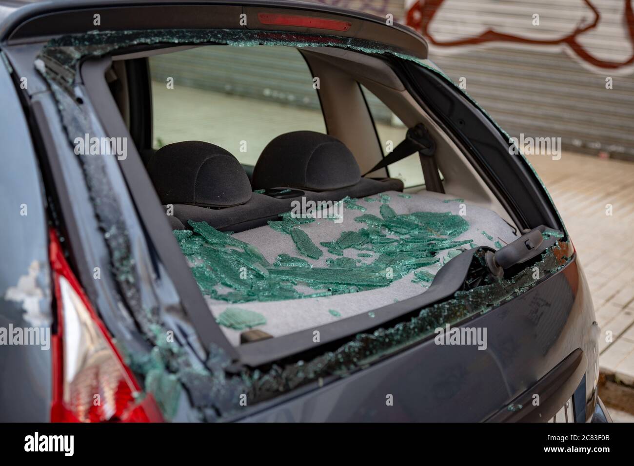 Car with a broken back glass after an accident Stock Photo - Alamy