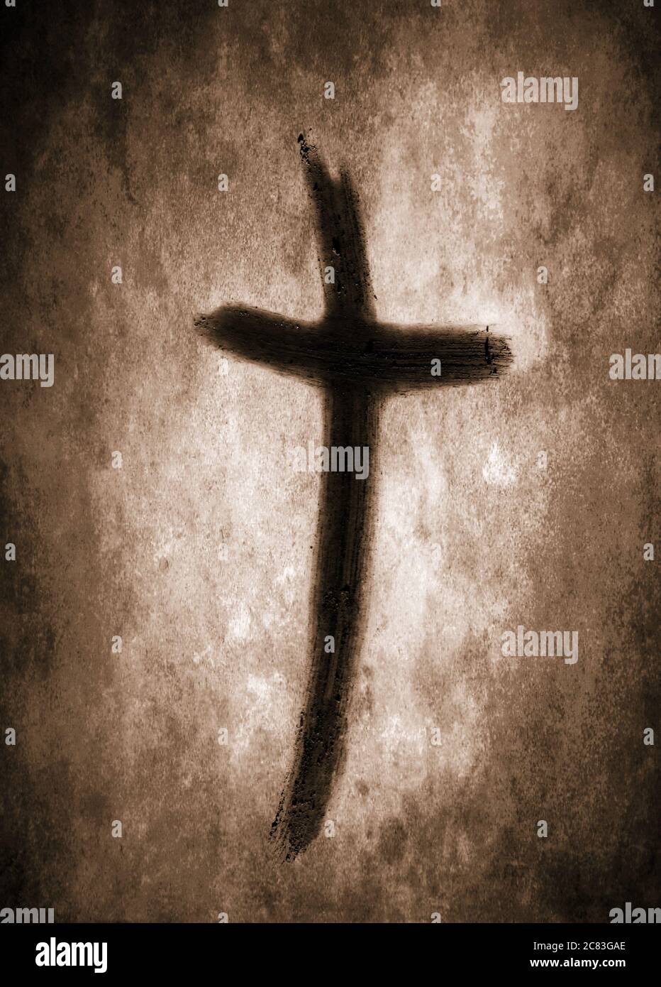 Vertical shot of a black drawn cross on a beige background Stock Photo ...