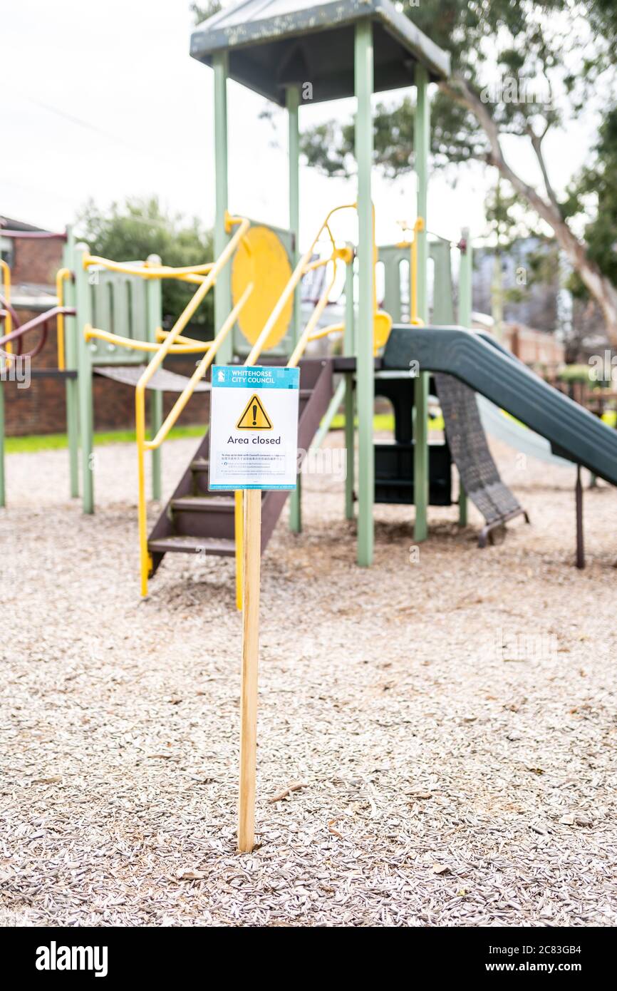 A area closed sign in front of a playground due to the pandemic Stock ...