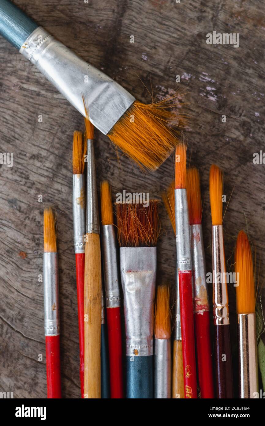 Vertical overhead shot of different paintbrushes Stock Photo - Alamy