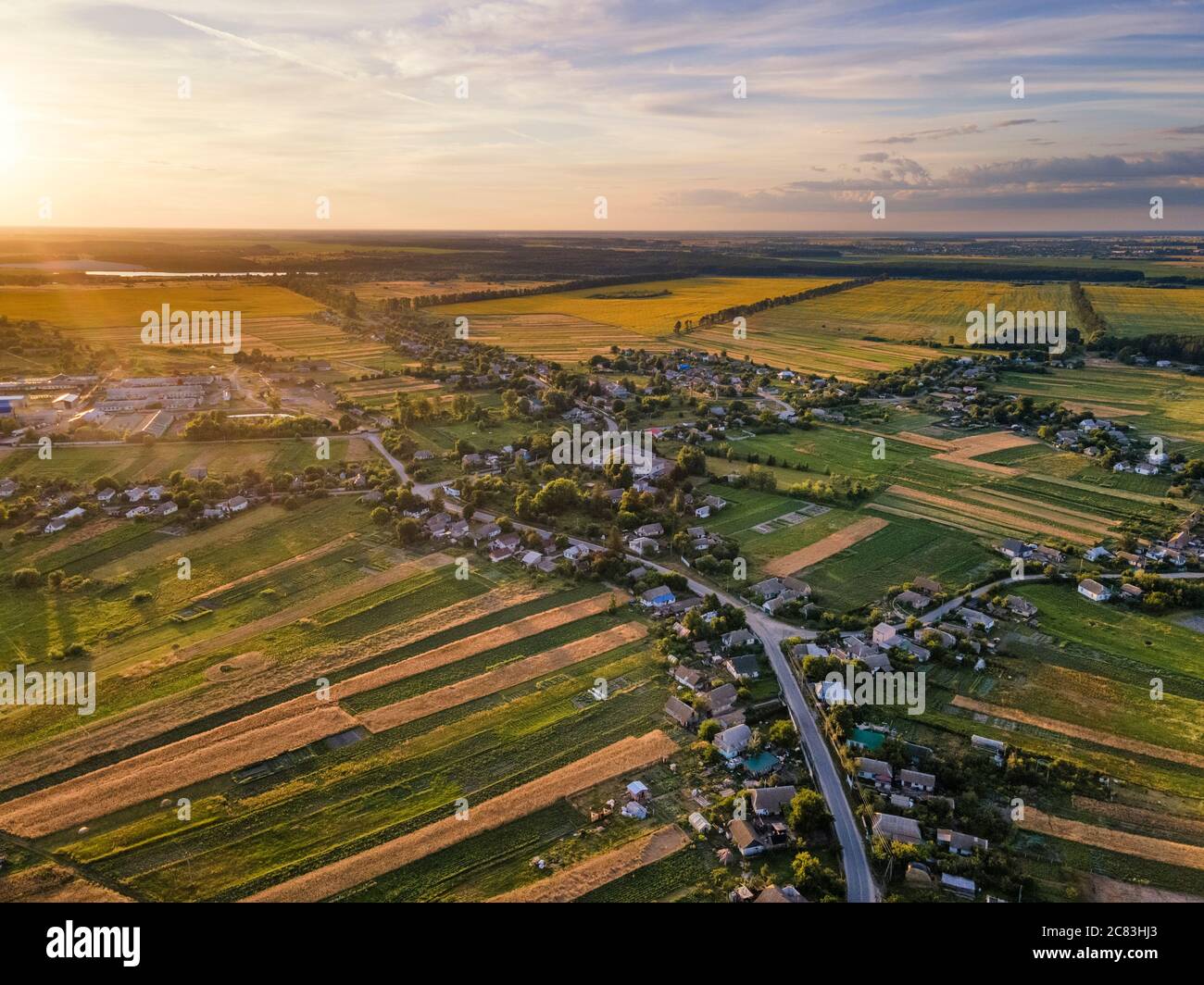 Amazing aerial countryside landscape. Sunset over green and yellow ...