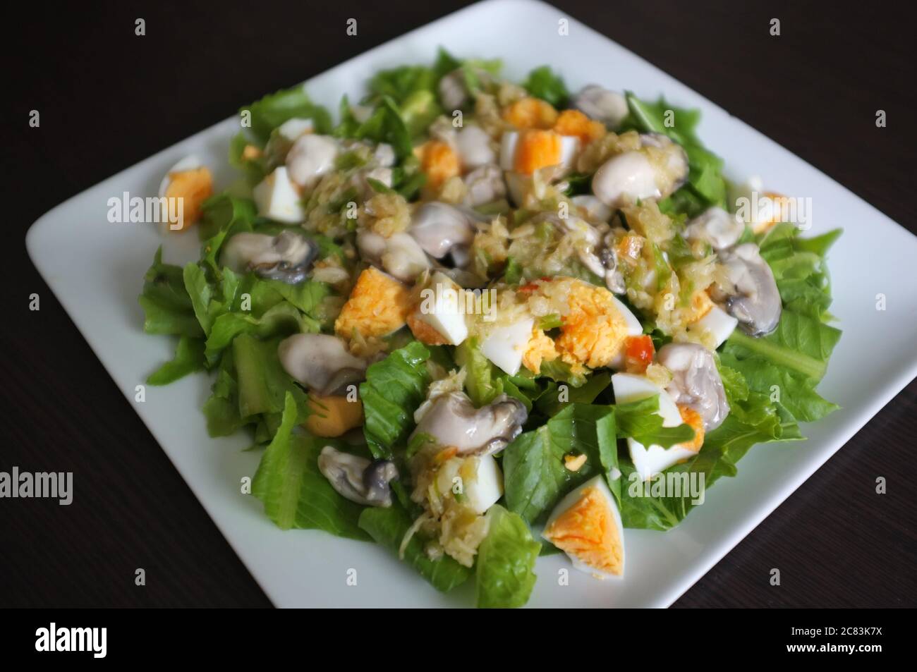 Spicy uncooked oyster with thai herbs . Seafood menu served at Thai ...